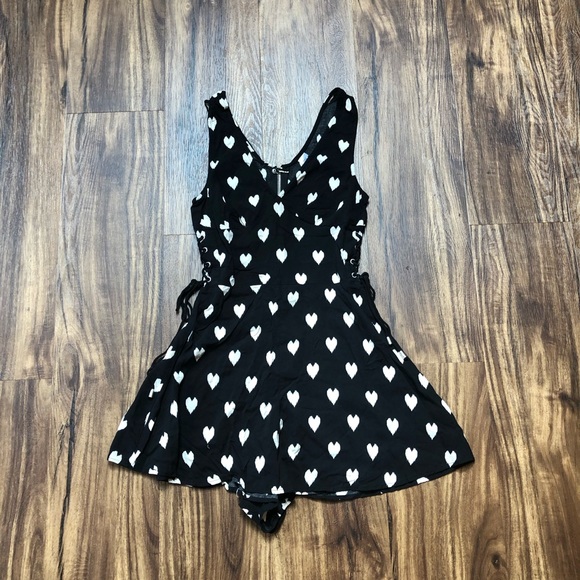 Pants & Jumpsuits | Black And White Lace Up Heart Romper | Poshmark